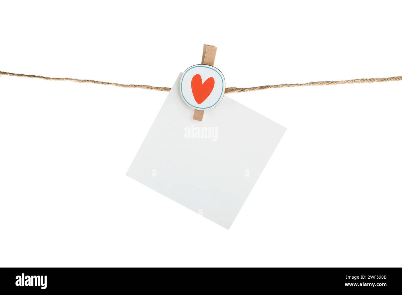 Empty paper note hanging on a rope isolated on a white background Stock ...