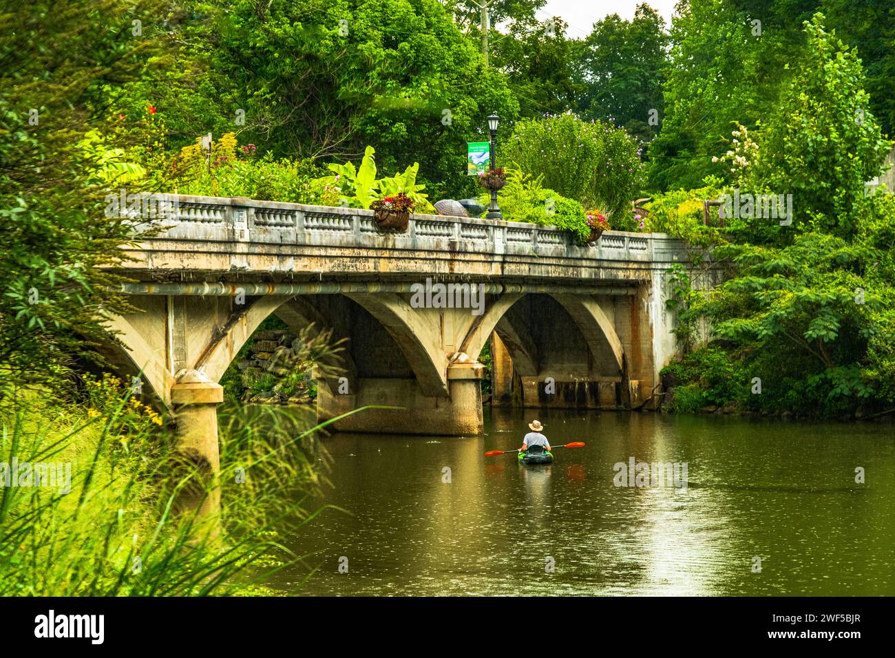 Kayaker floating at Lake Lure Flowering Bridge at Lake Lure North ...