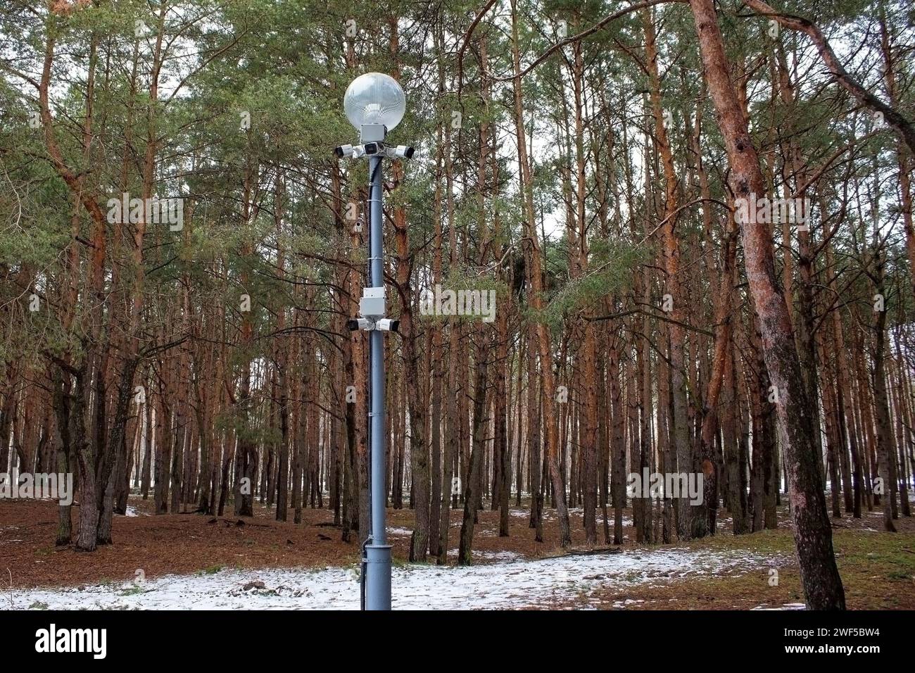 Outdoor surveillance cameras for security. The cameras are mounted on a ...