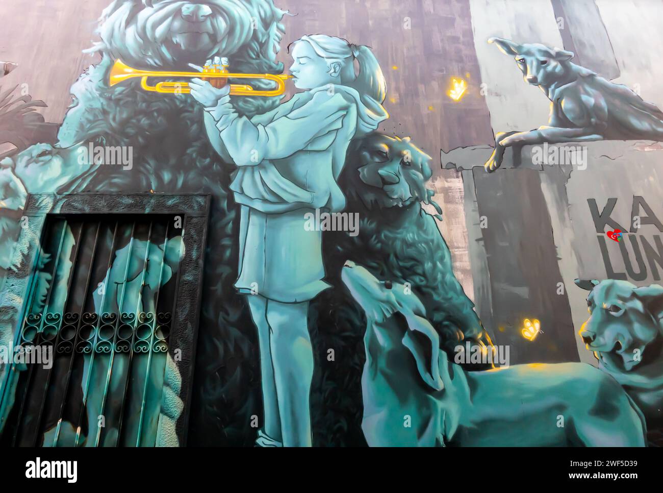 Izmir murals: Mural by Kacak Lunapark - A girl playing trumpet wall in ...