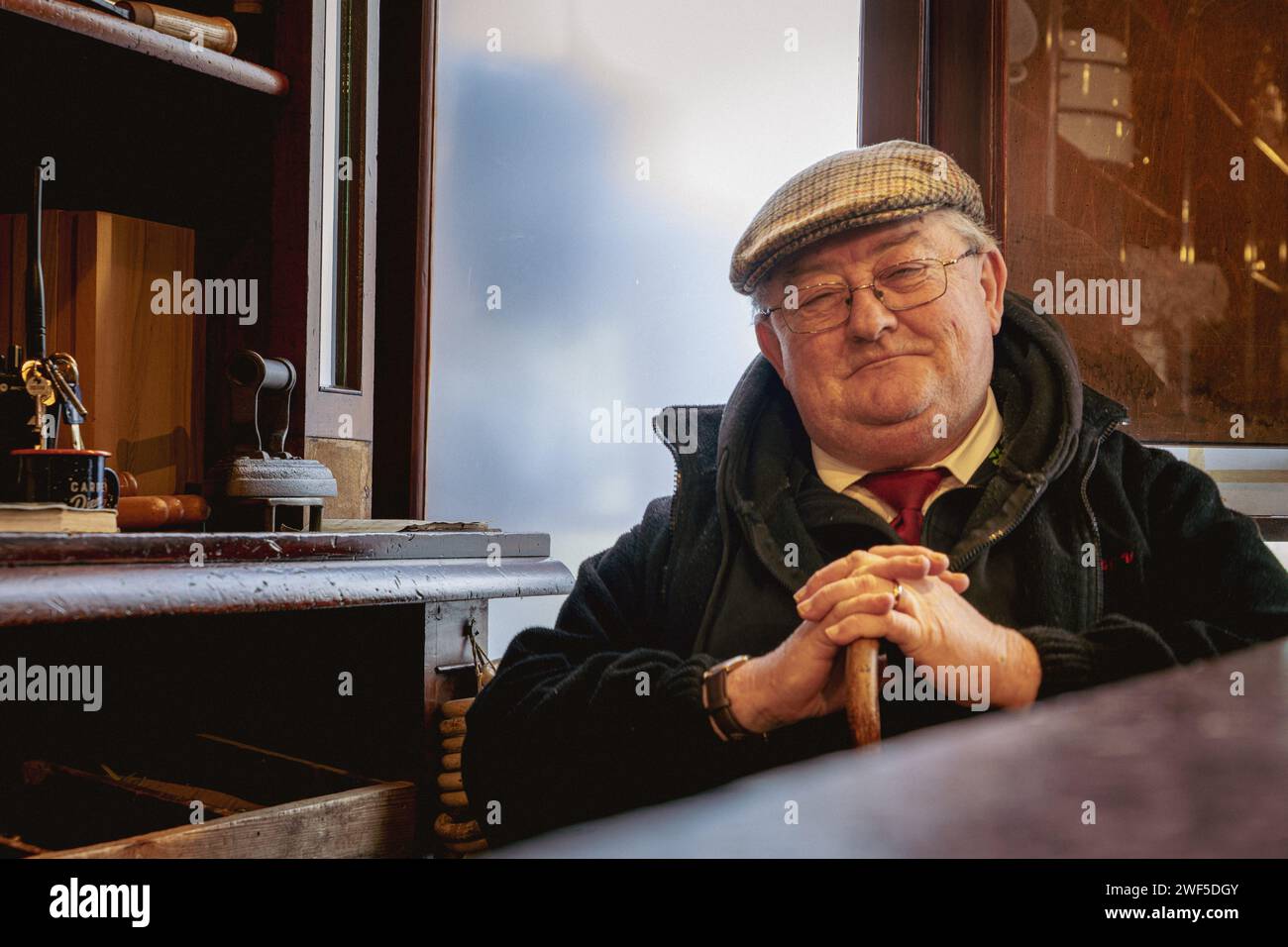 Worker at the St Fagans heritage museum in Cardiff, welcoming visitors ...