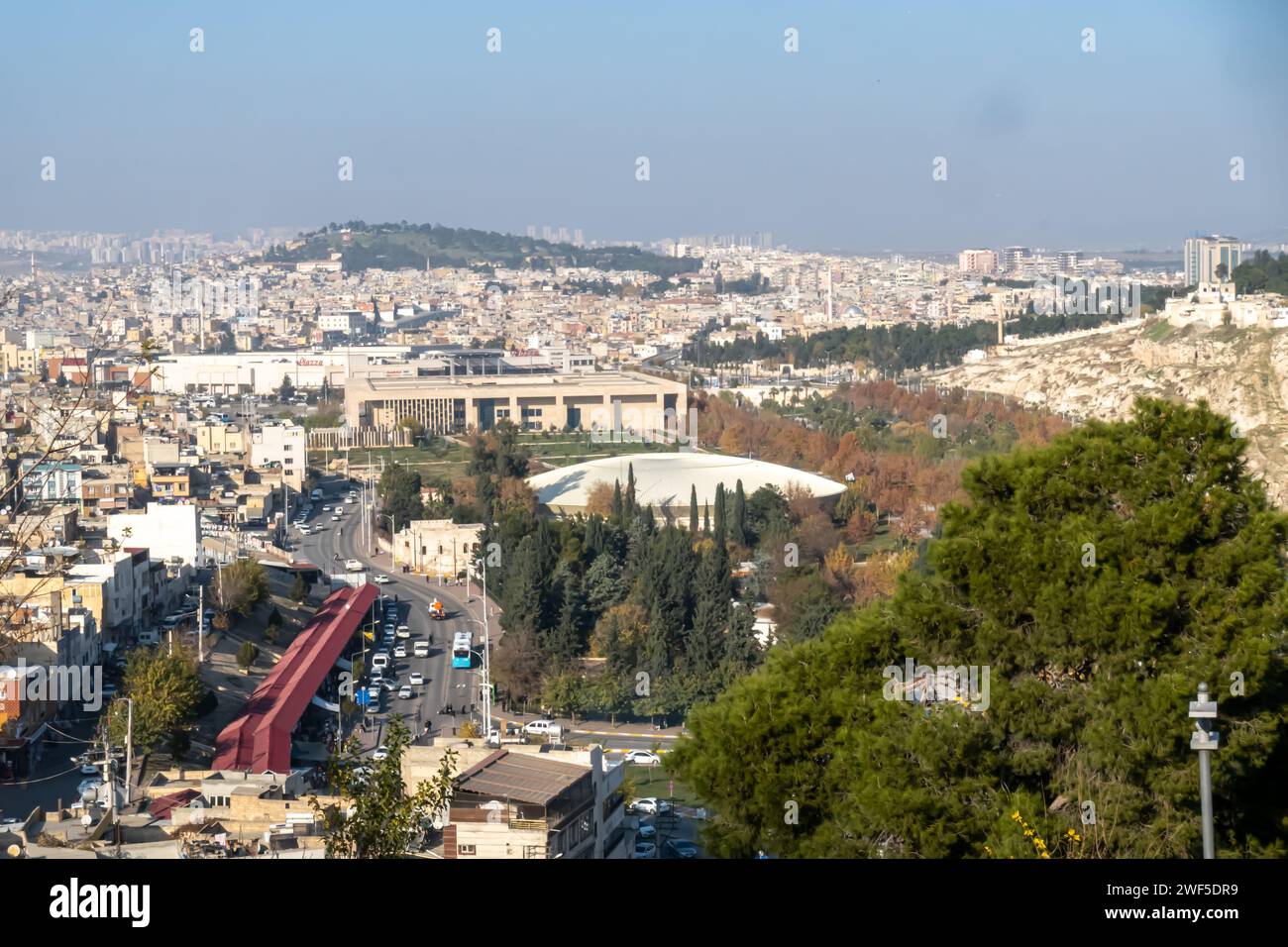 Historic old town Sanliurfa cityscape, hilly sides with densely ...