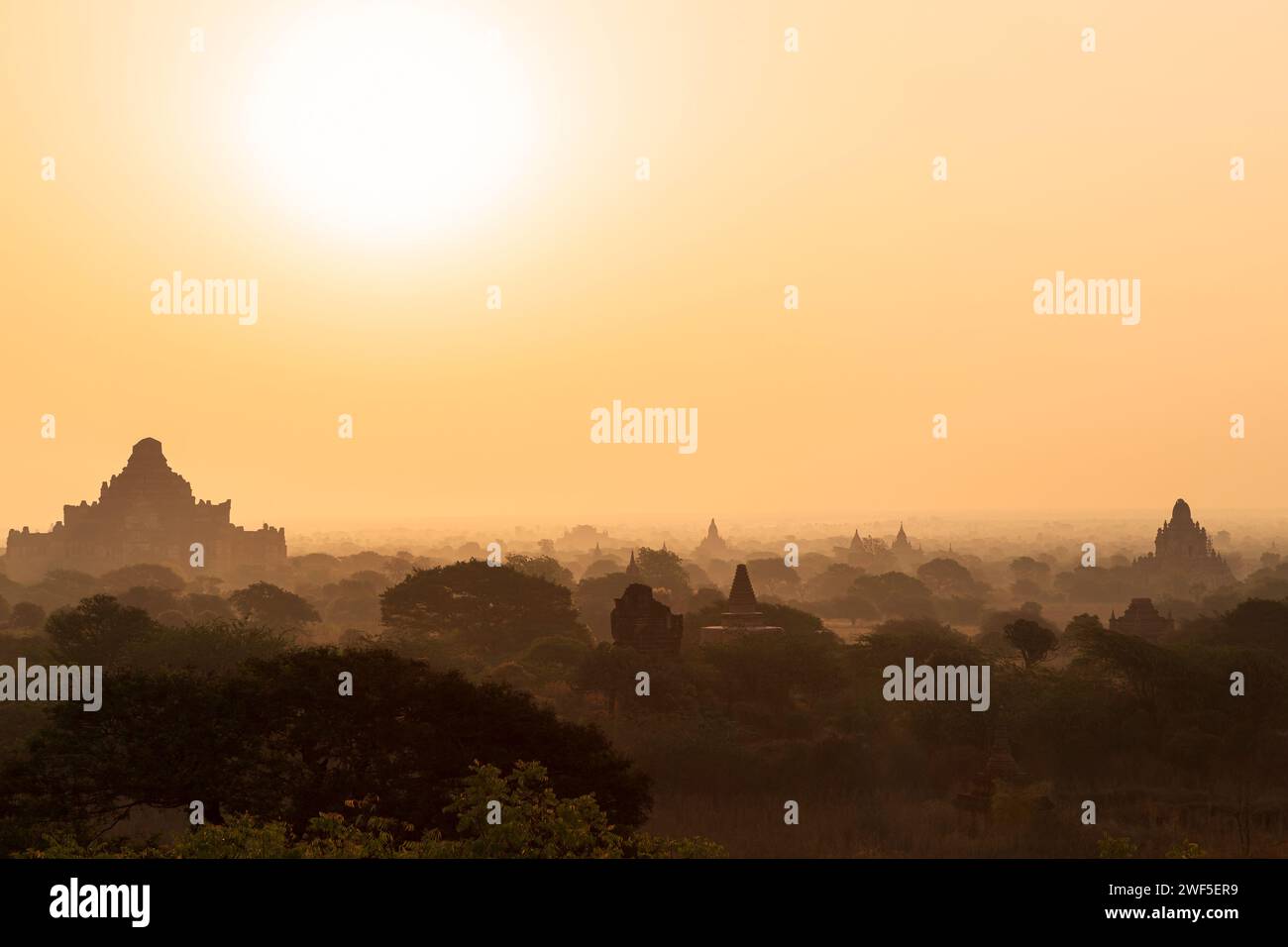 Scenic landscape and silhouette of many ancient temples and pagodas at ...