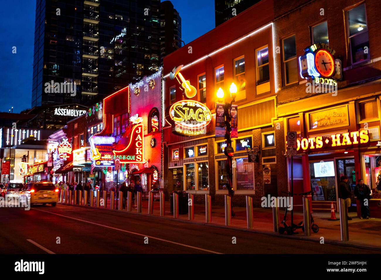 Nashville, TN, USA - 12-24-2023: Famous Neon signs of blues clubs on Beale street illuminated at ...
