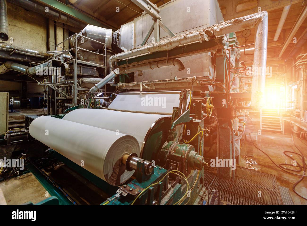 Waste paper recycling plant. Machine for production of paper rolls ...