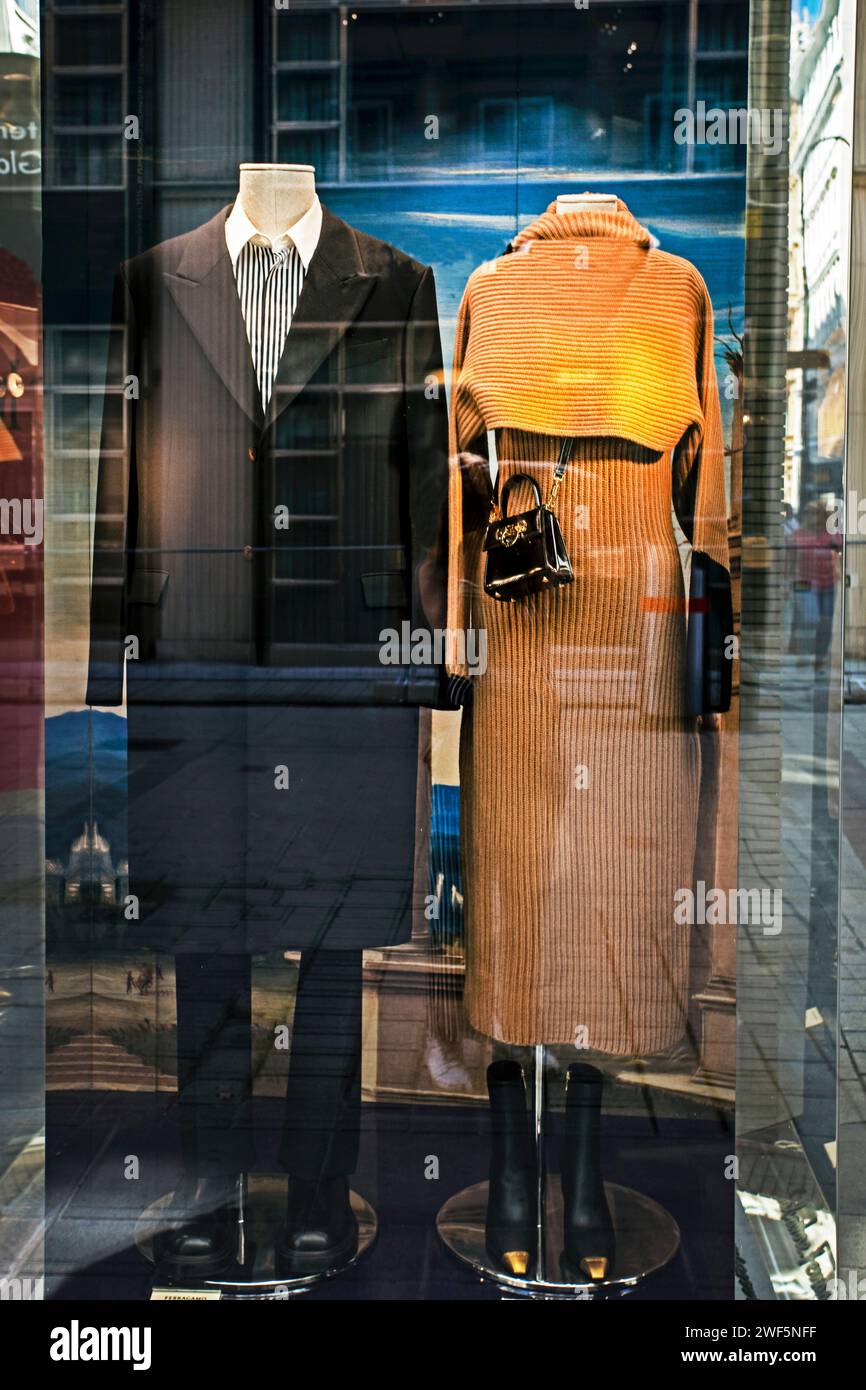 stylish male and female mannequins in a suit and dress. Fashion & Style ...