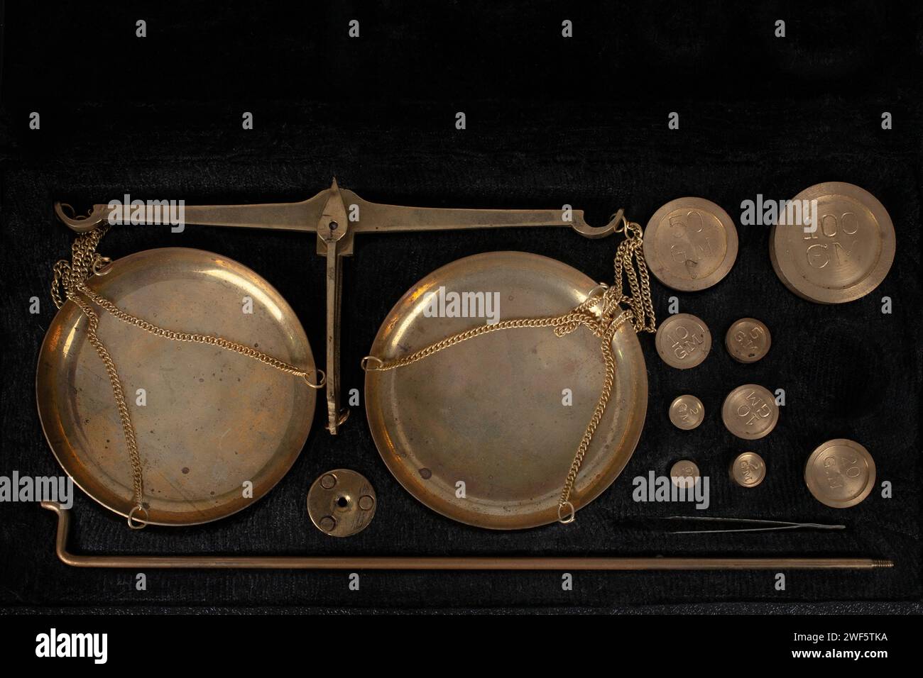 Bronze traditional balance scale set with weights in black box Stock ...