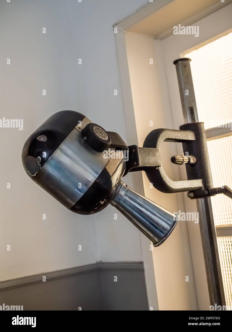 Vintage old medical device in an exhibition of old medical devices ...