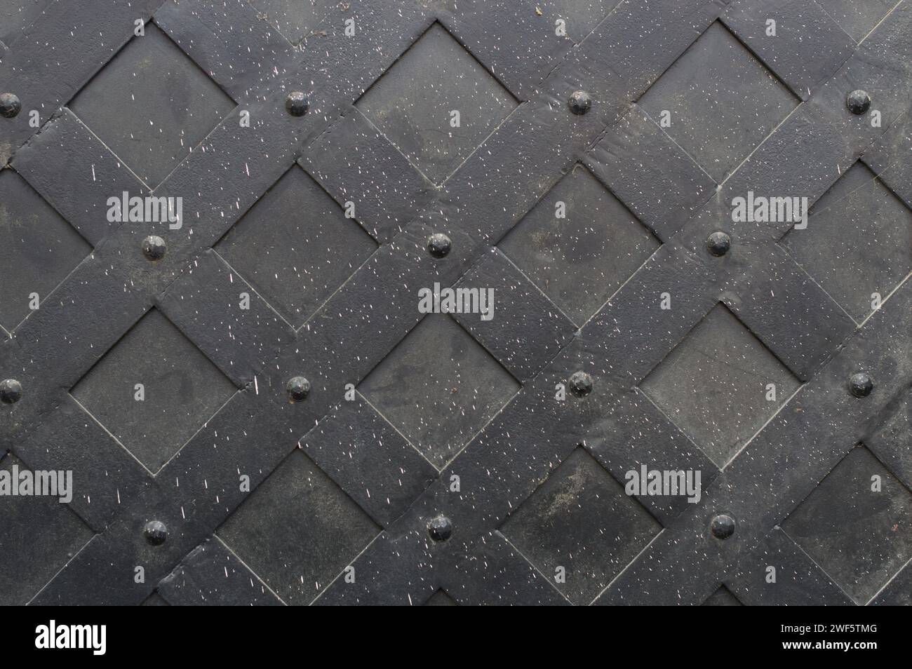 Intricate details and textures of an ancient steel gate, showcasing the ...