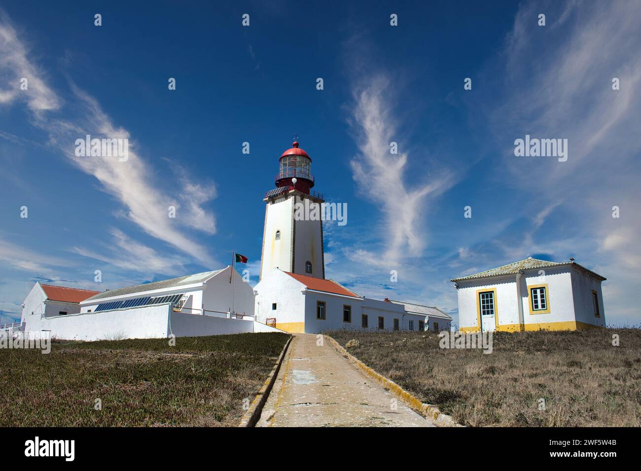 Lighthouse. Rocky cliffs with limestone face along the perimeter of the ...