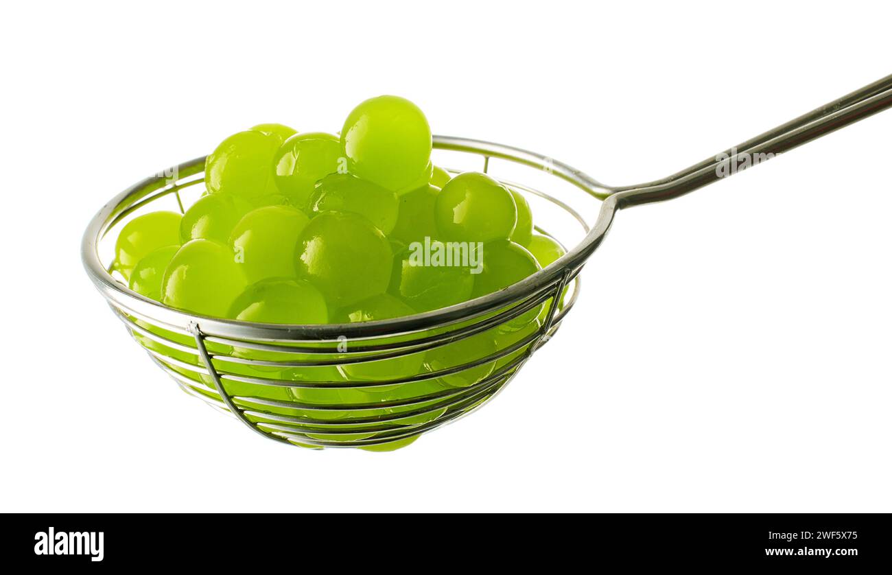 green jelly balls for making bubble tea in strainer isolated on white ...