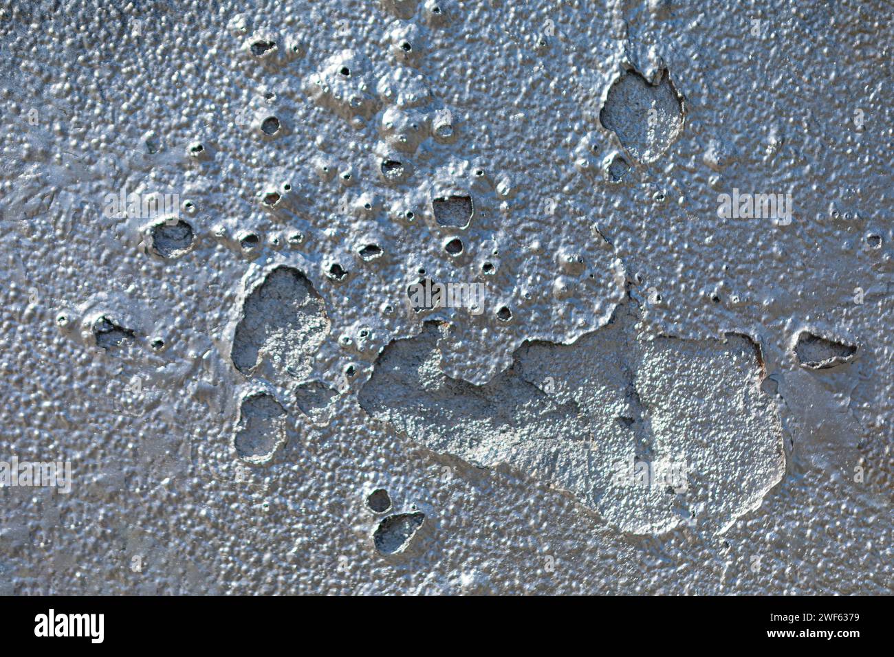 Silver colored surface of an old concrete wall. Abstract background for ...