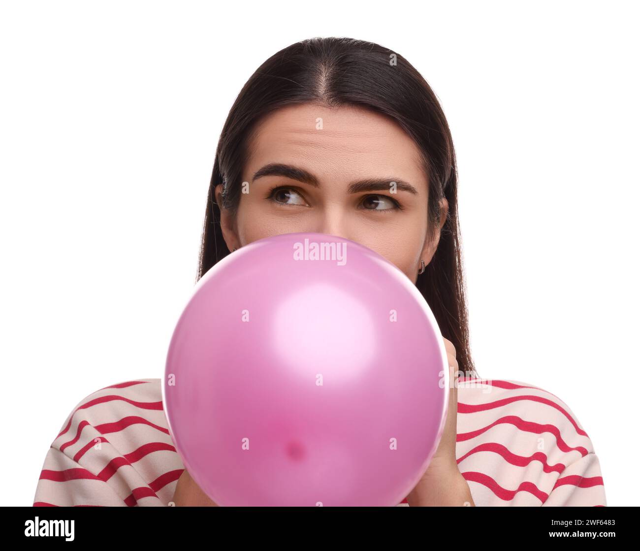 Woman inflating pink balloon on white background Stock Photo - Alamy