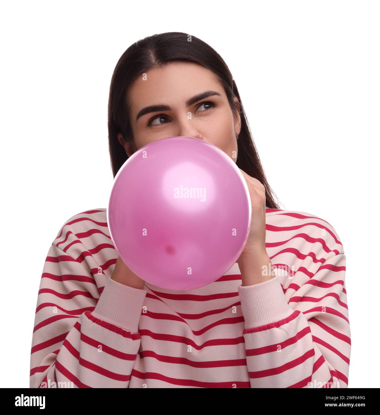 Woman inflating pink balloon on white background Stock Photo - Alamy