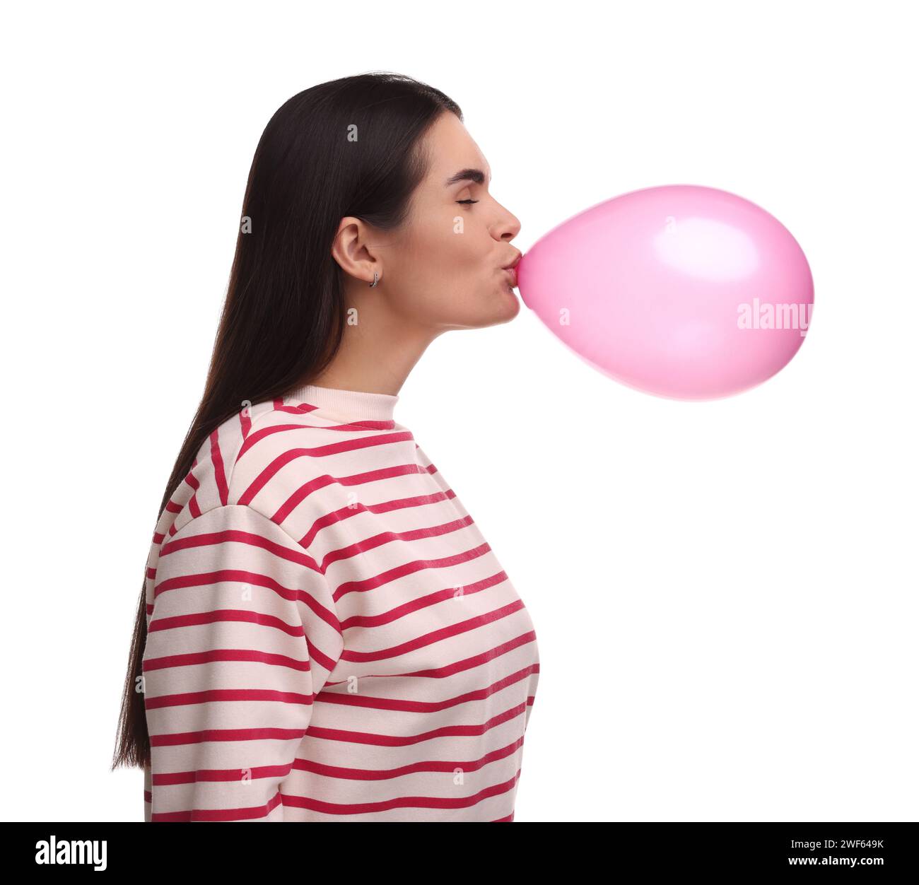 Woman inflating pink balloon on white background Stock Photo - Alamy