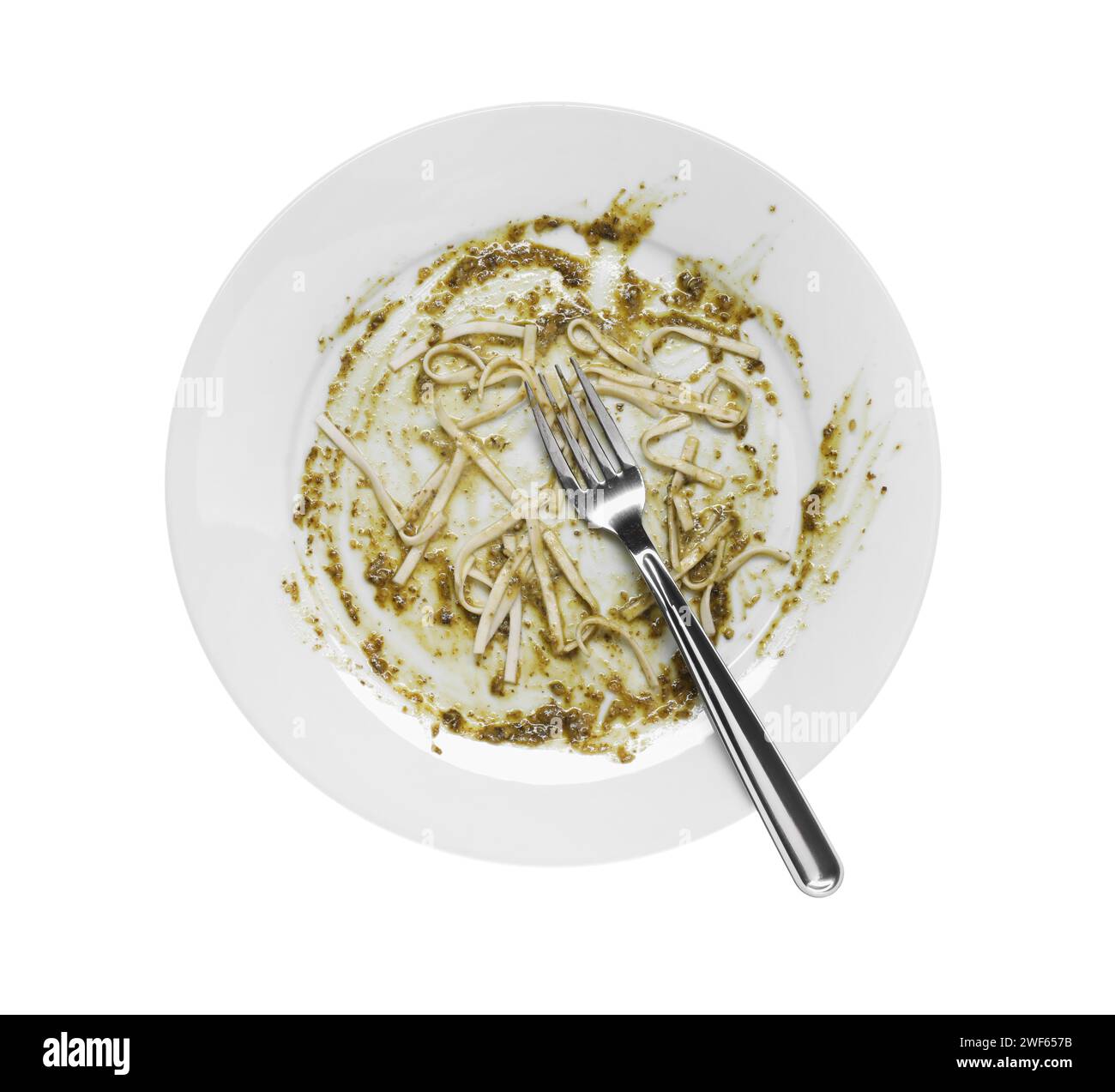 Dirty plate and fork on white background, top view Stock Photo - Alamy