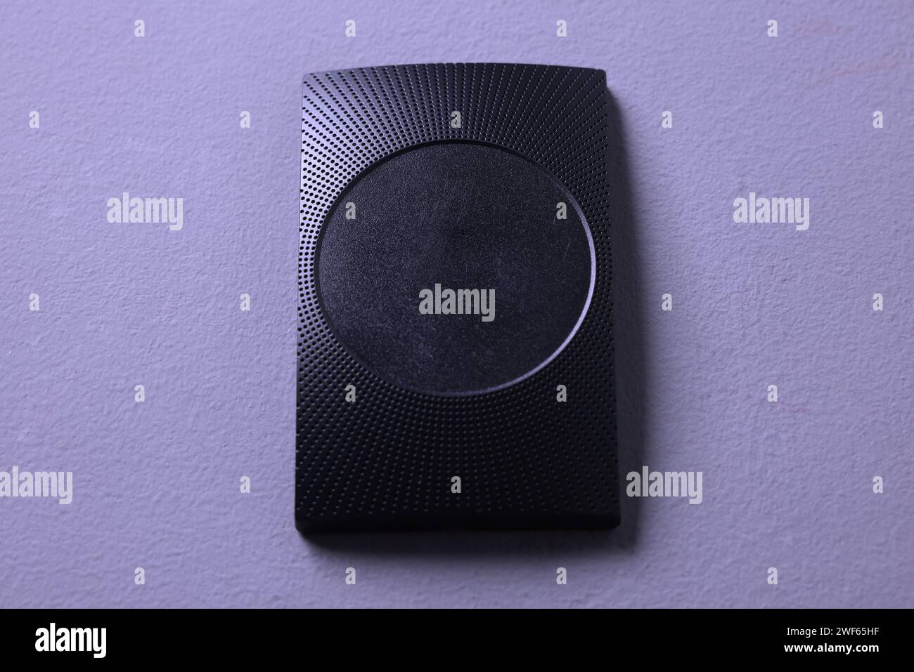 Magnetic door lock on violet textured wall. Home security Stock Photo ...