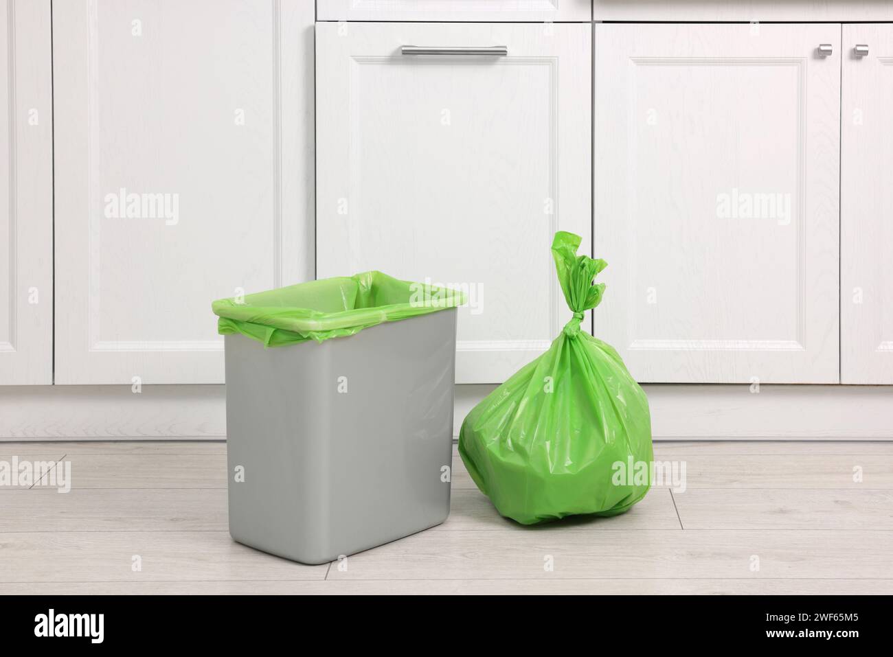 Full trash can in kitchen hi-res stock photography and images - Alamy