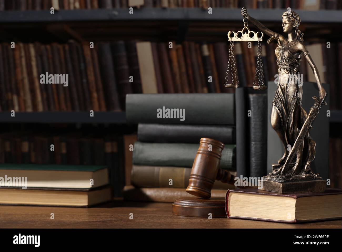 Lady justice statue law table hi-res stock photography and images - Alamy