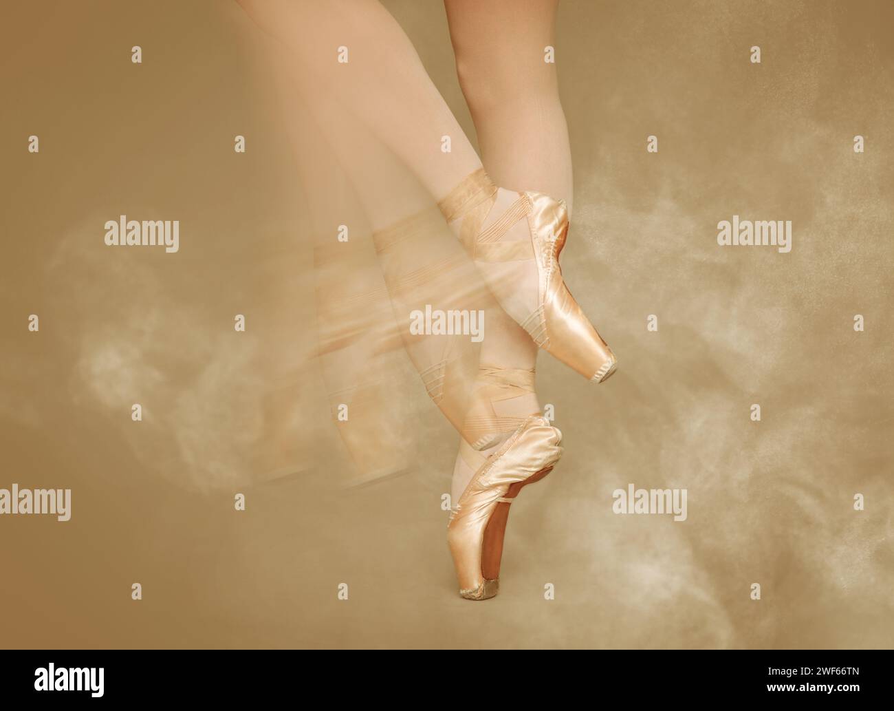Perfection in ballet. Woman dancing in pointe shoes on dark beige ...