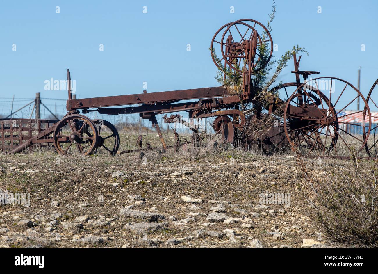 Metal frame of an old rusting tractor Stock Photo - Alamy