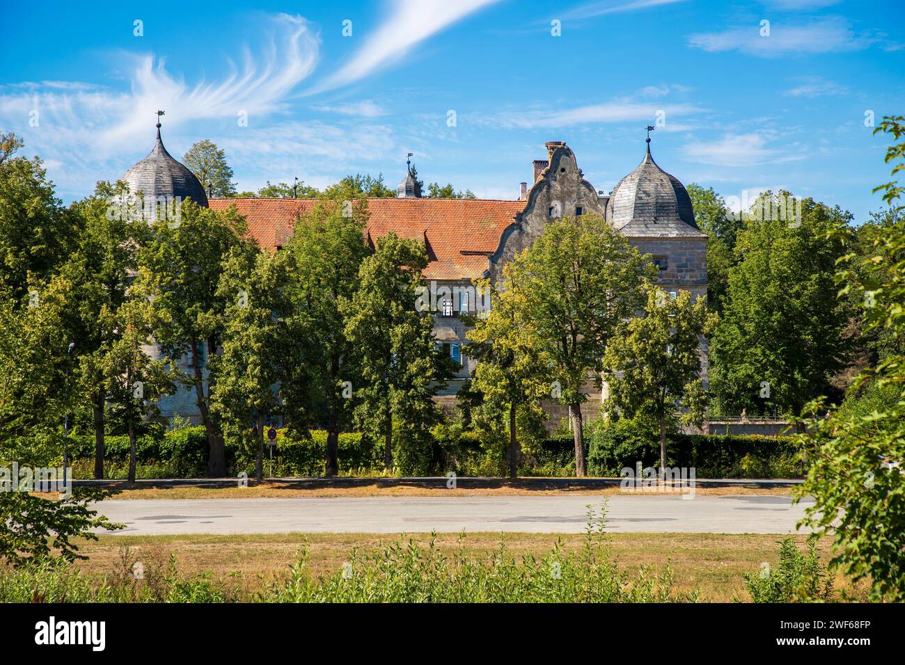 The East Side Of The Mitwitz Water Castle Behind Tall Deciduous Trees ...