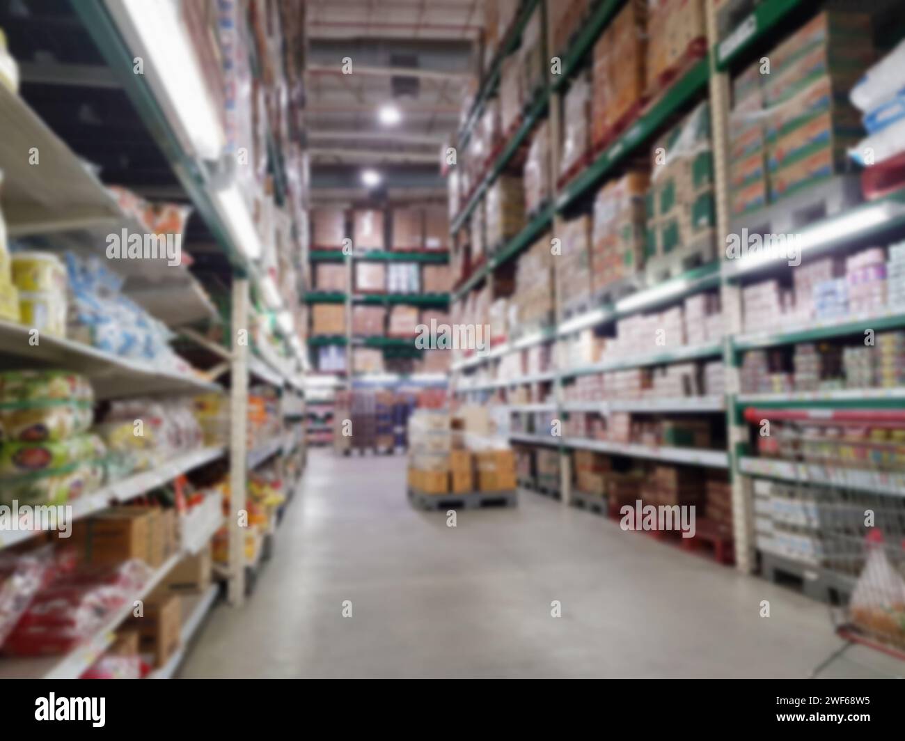 Blur supermarket or warehouse aisle background Stock Photo - Alamy