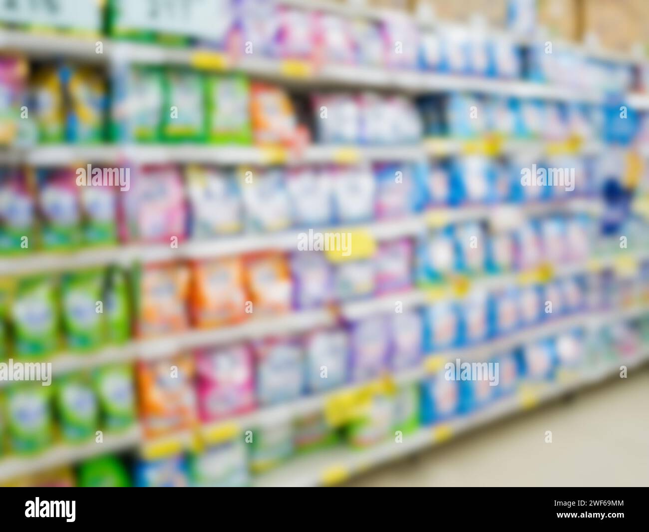 detergent shelves in laundry section in supermarket or grocery store blurred background Stock ...
