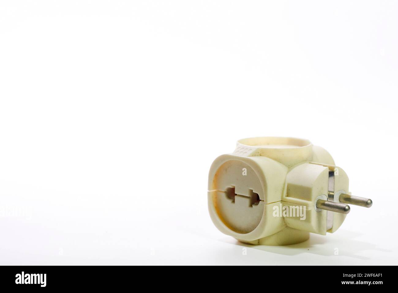 Dirty adapter socket plug, power outlet isolated on white background ...