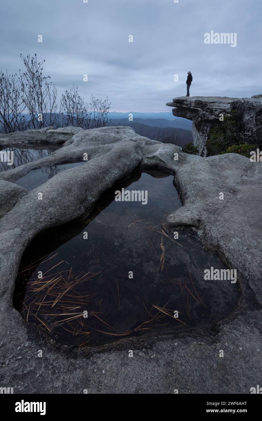 A man poses at the edge of the famous McAfee Knob overlook, one of the ...