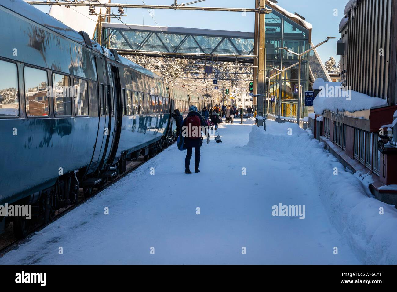 Gelio, Norway. 17th Nov, 2023. A passenger is seen walking along one of ...