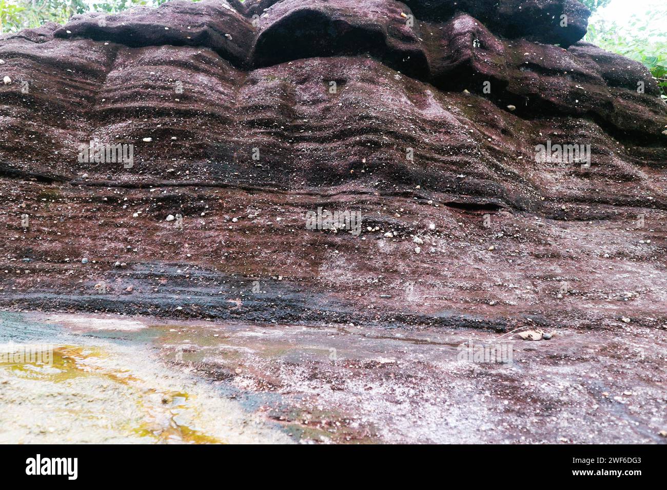 An ancient rock layer that was pushed up from the ground. become a hill ...