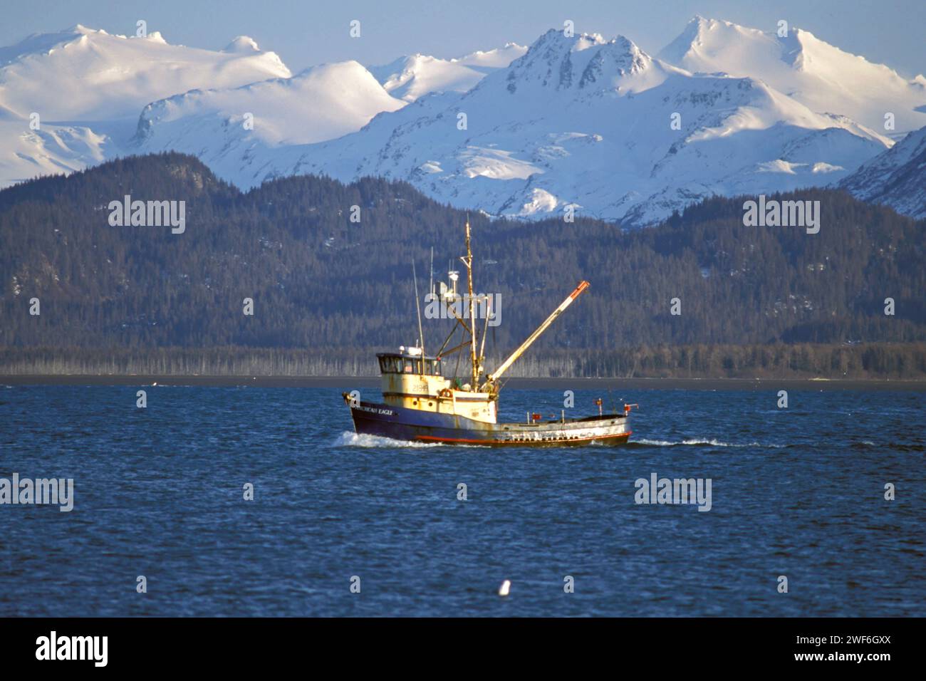 commerical fishing vessel coming into the Homer boat harbor, Homer ...
