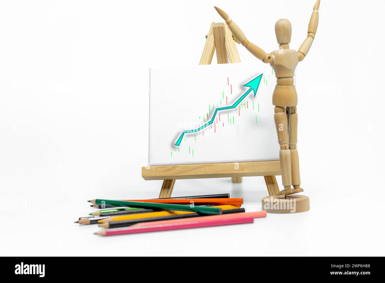 Mannequin drawing a graph charts on easel; isolated on white background ...