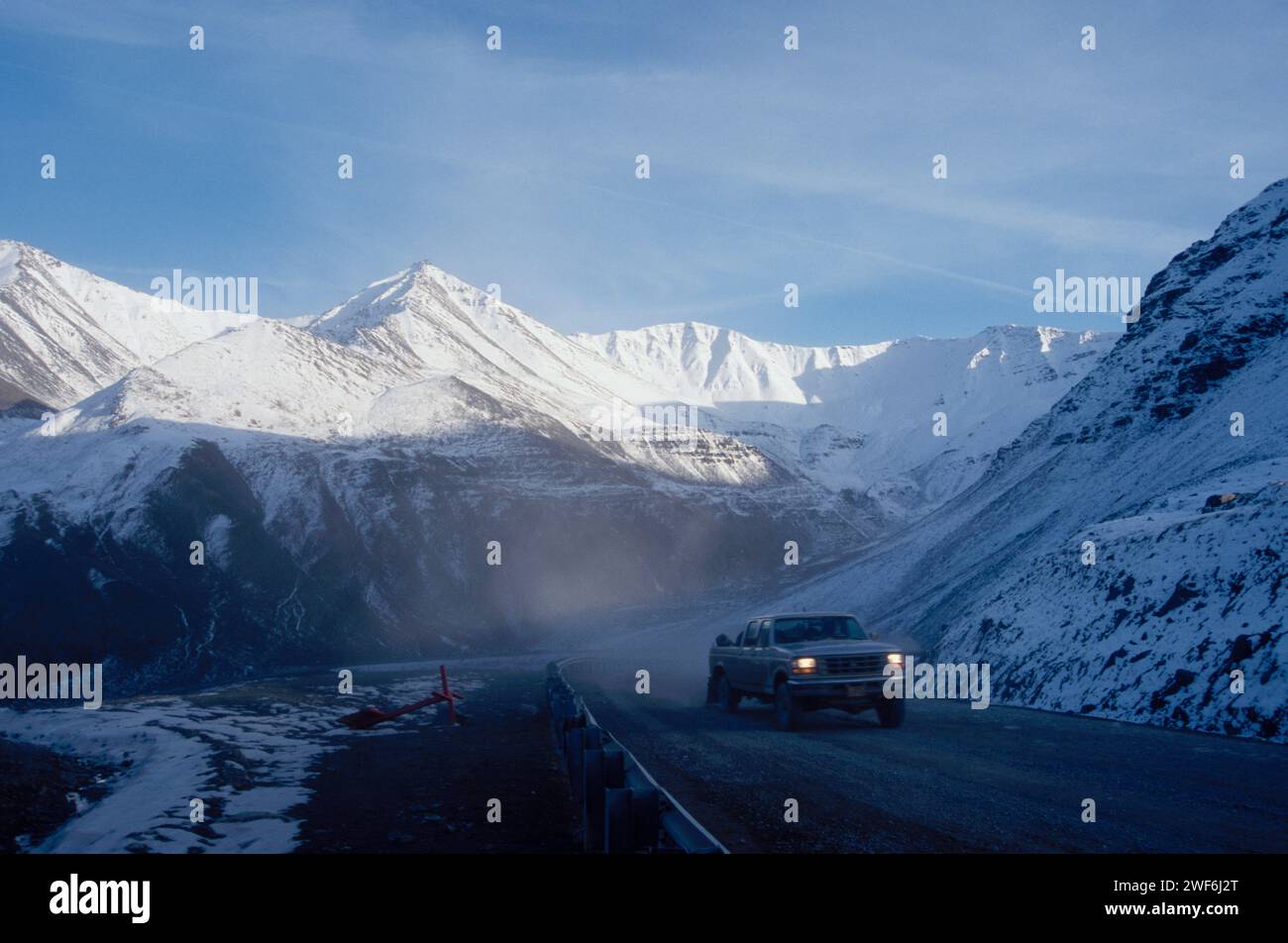 Truck travelling up the steep grade of Atigun Pass Haul Road Brooks ...