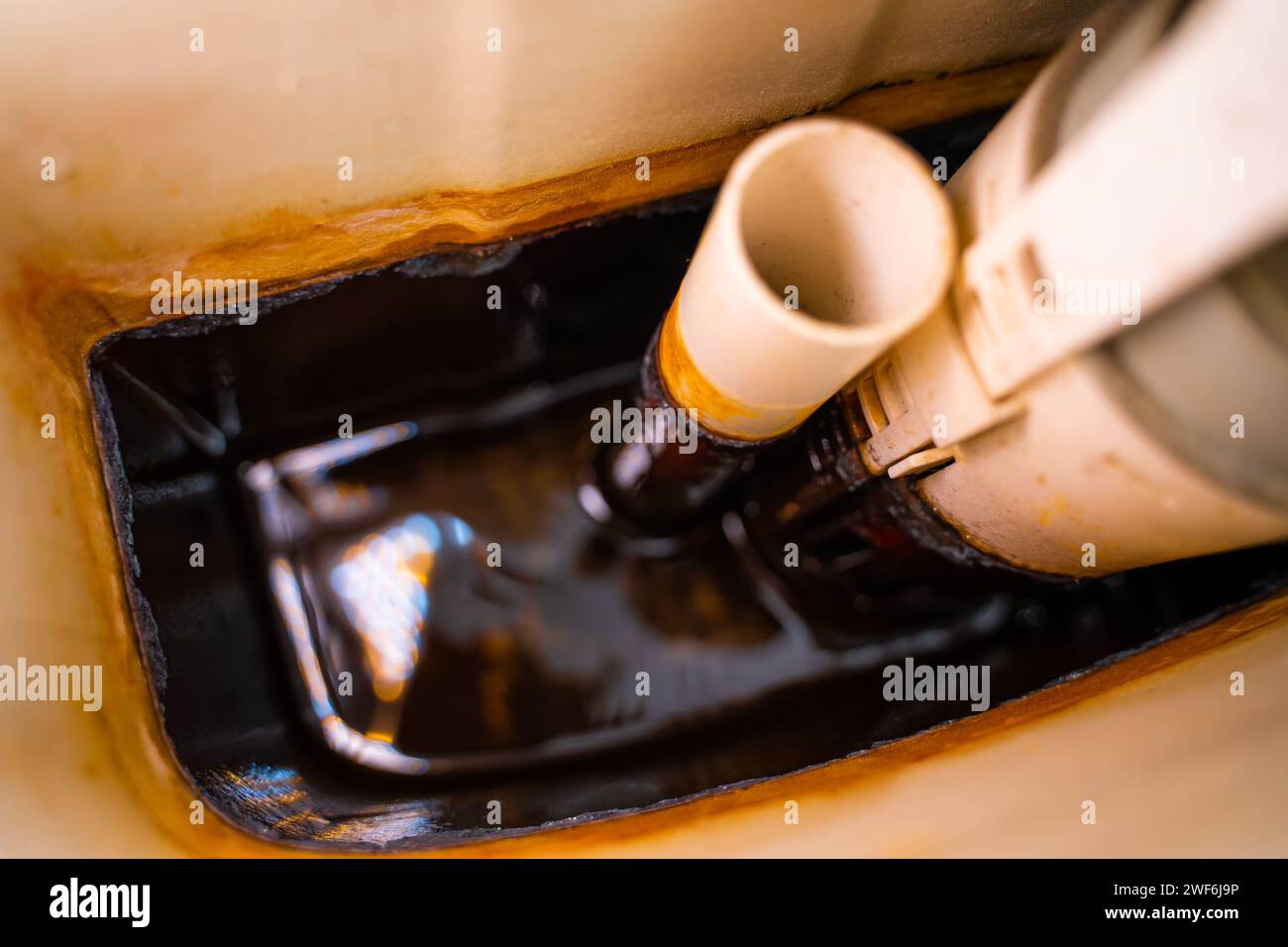 Dark dirty water in the toilet cistern, close-up Stock Photo - Alamy