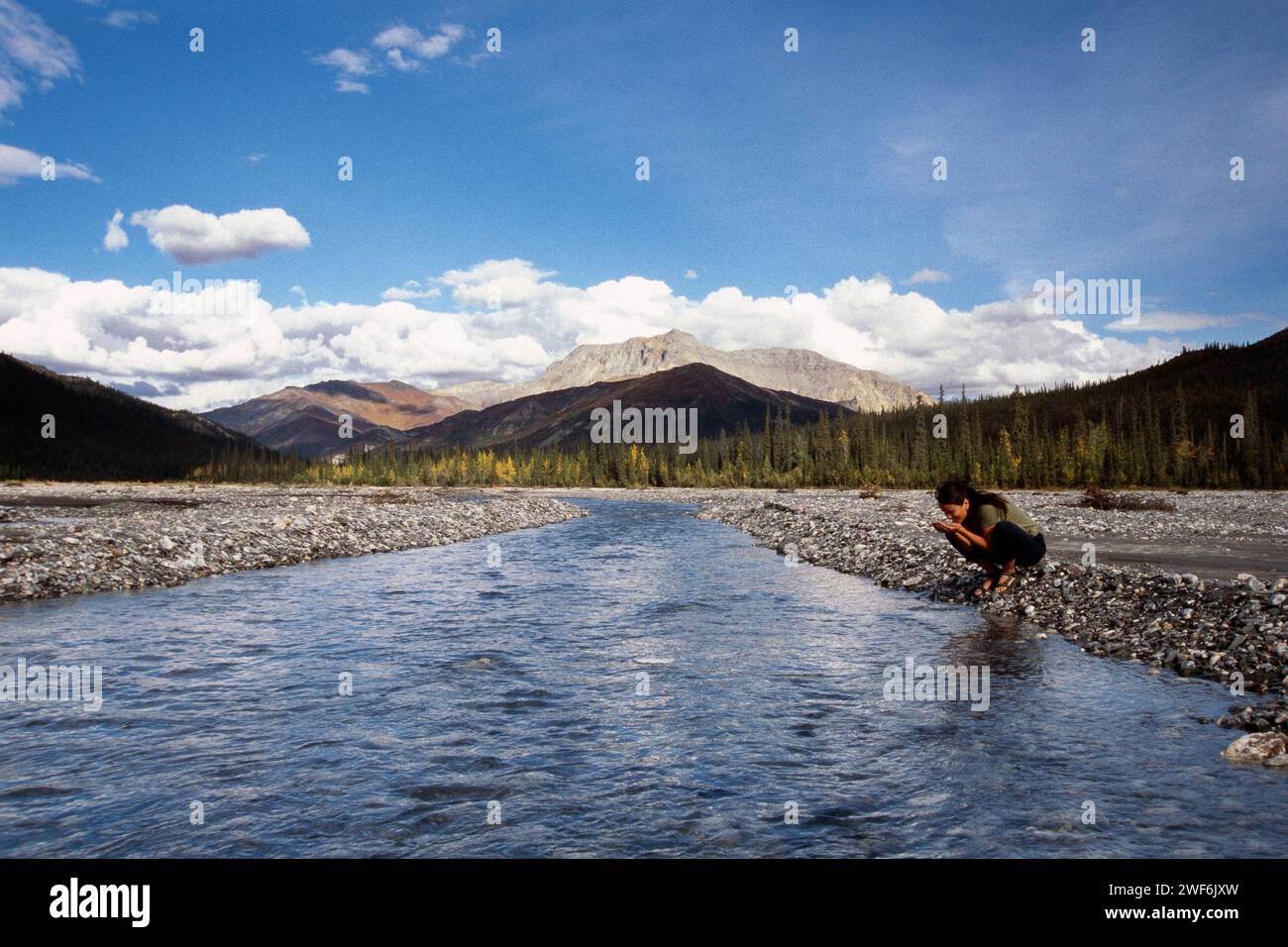 traveller Sunny Coulson washes her face in a river, southside of the ...