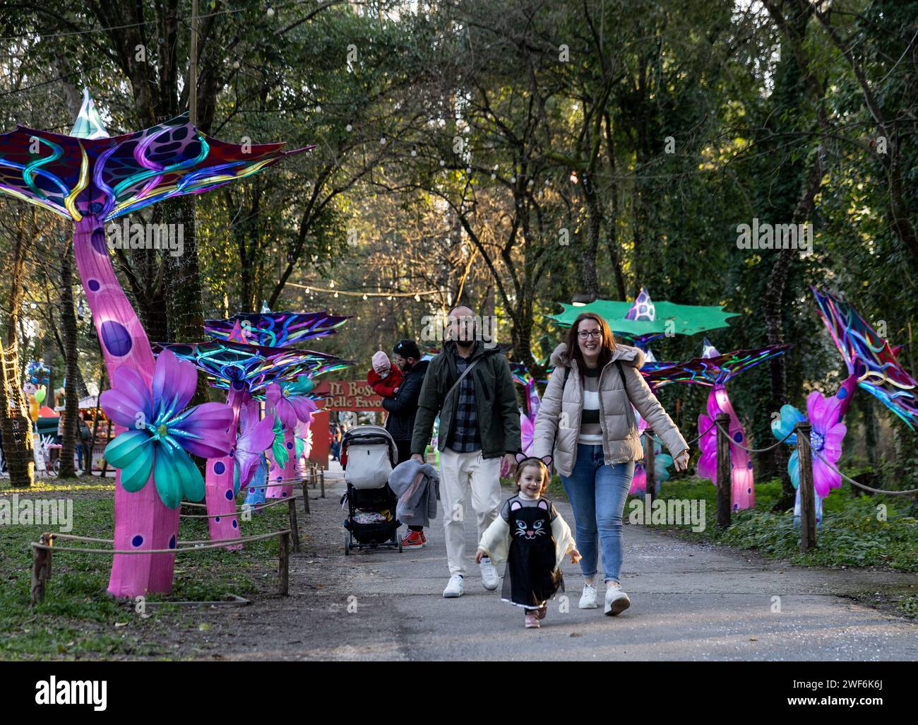 Cassino, Italy. 28th Jan, 2024. Visitors walk past lanterns during the ...