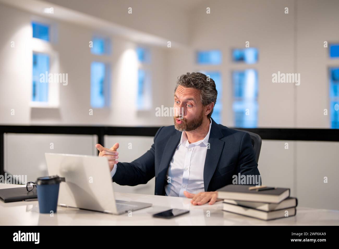 Business offices place. Angry Businessman working with laptop in office ...