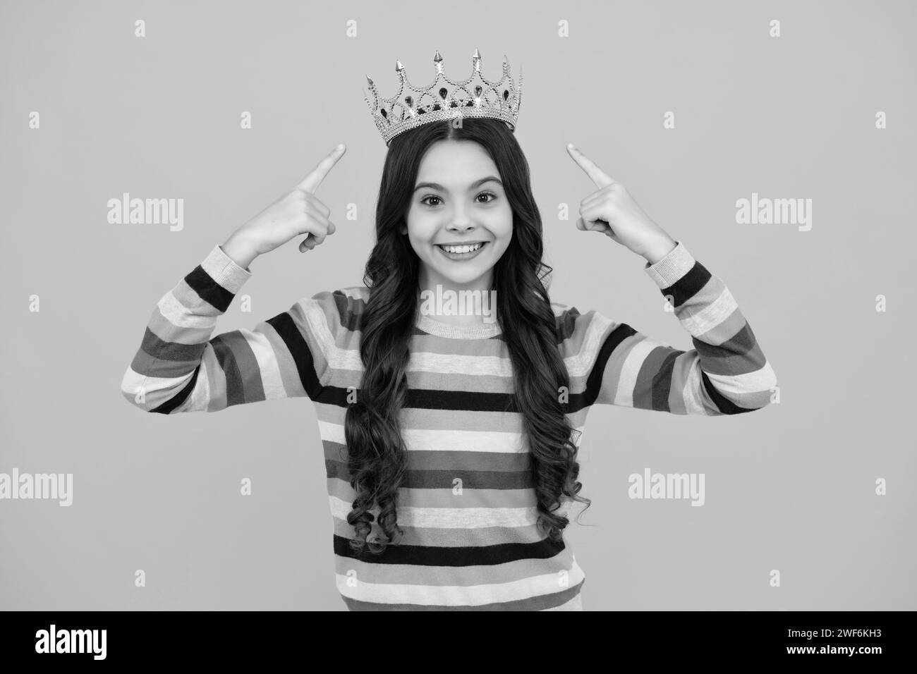 Happy teenager. Girls birthday party, funny kid in crown. Imagine ...