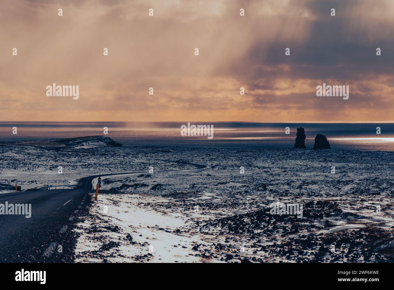 Storm of snow near lóndrangar in a windy march day Stock Photo - Alamy