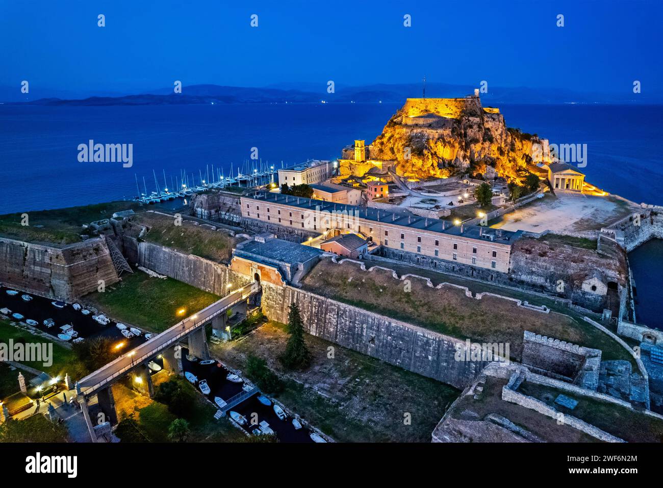 Aerial night view of the Old Fortress, Corfu Old Town, Corfu island ...