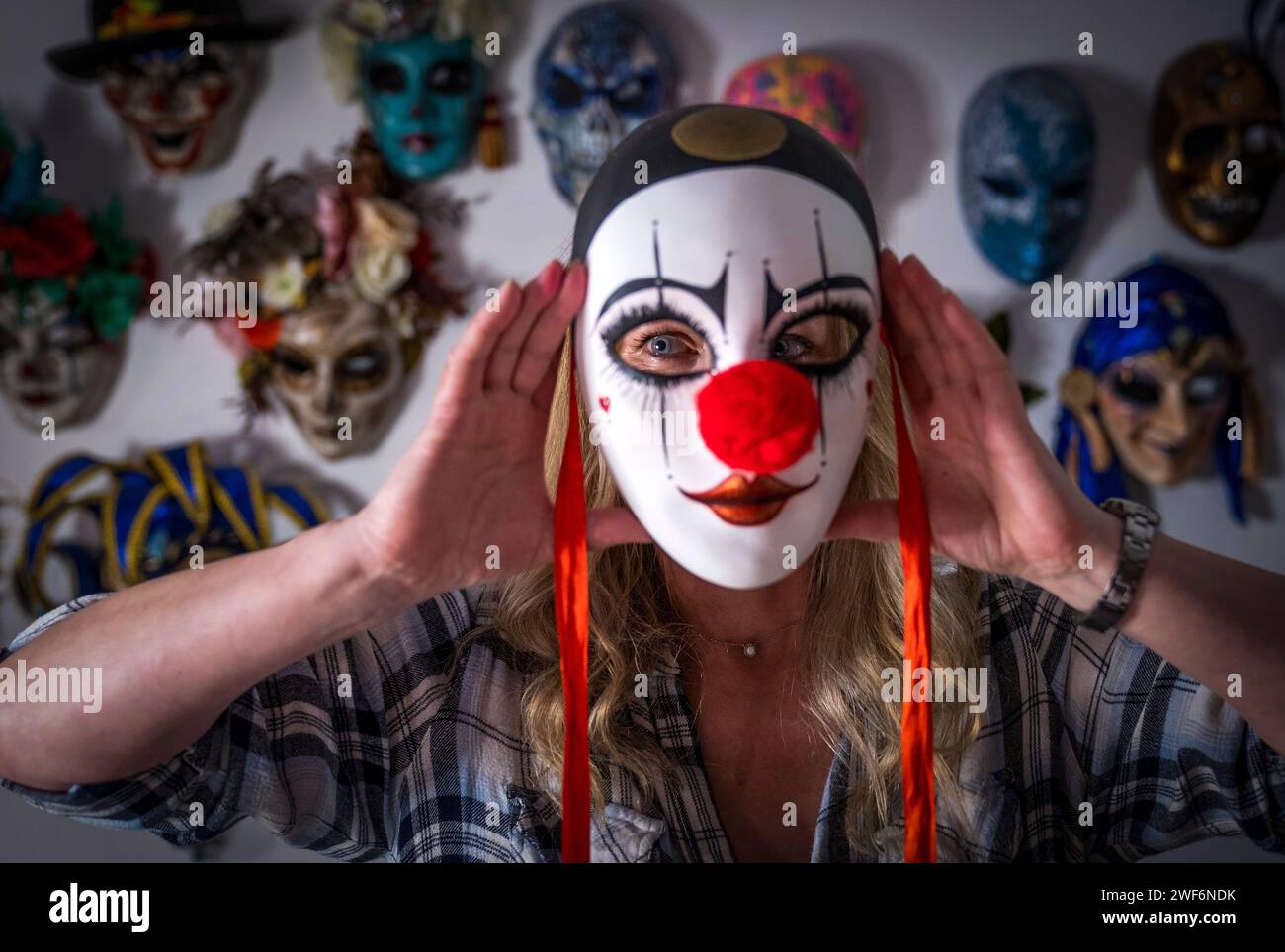 Edinburgh mask maker Lorraine Pritchard alongside some of her Venetian ...