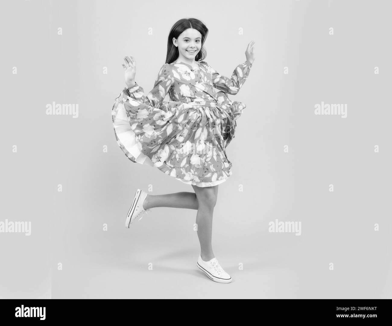 Happy teenager, positive and smiling emotions. Happiness, freedom, motion and child. Young ...