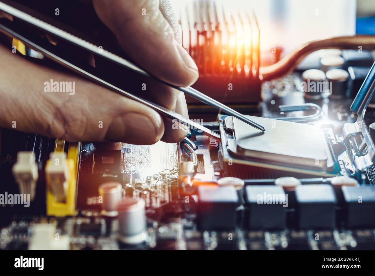 Engineer fixing computer Stock Photo - Alamy