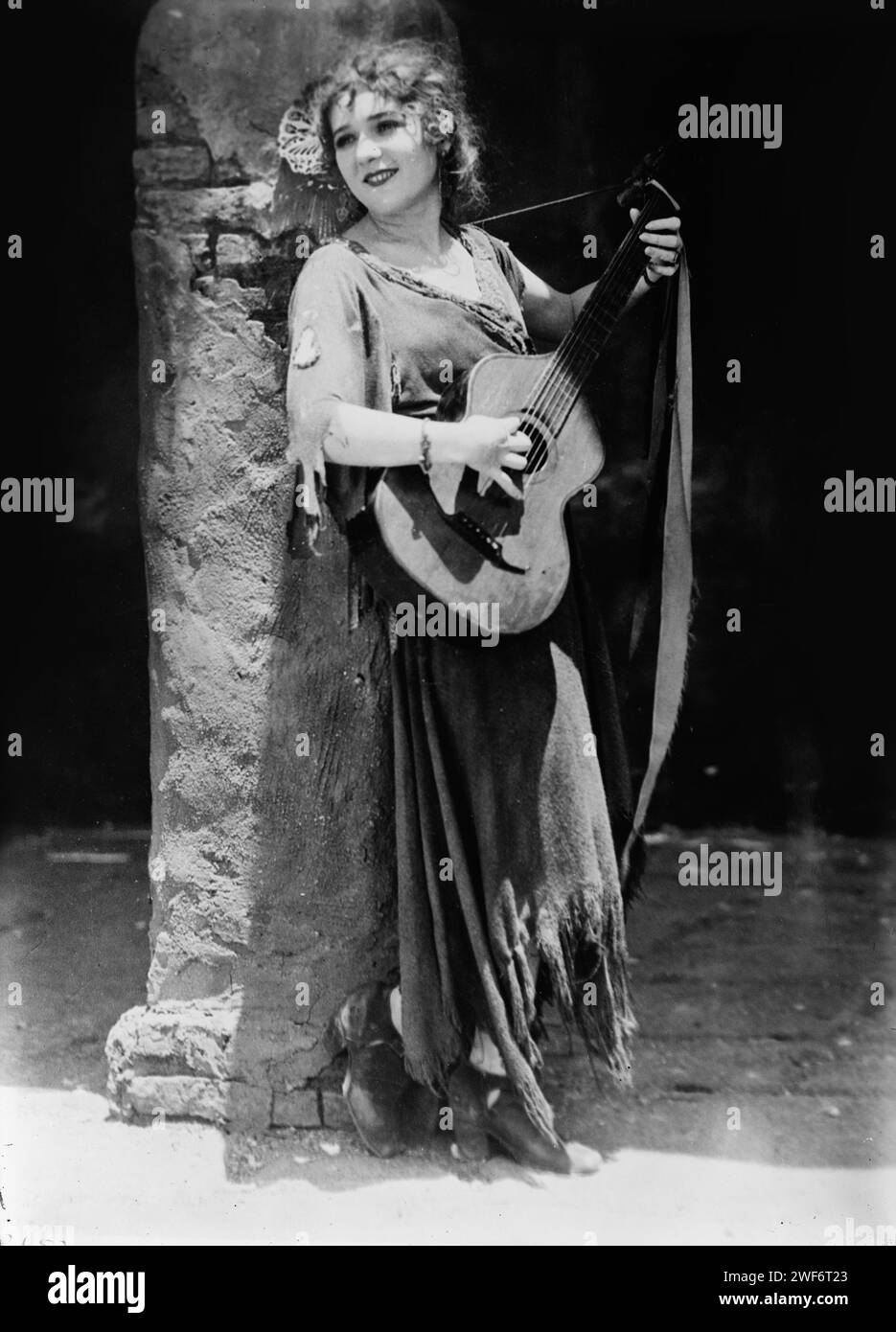 Acrtress and Hollywood star, Mary Pickford playing a guitar, c 1925 ...