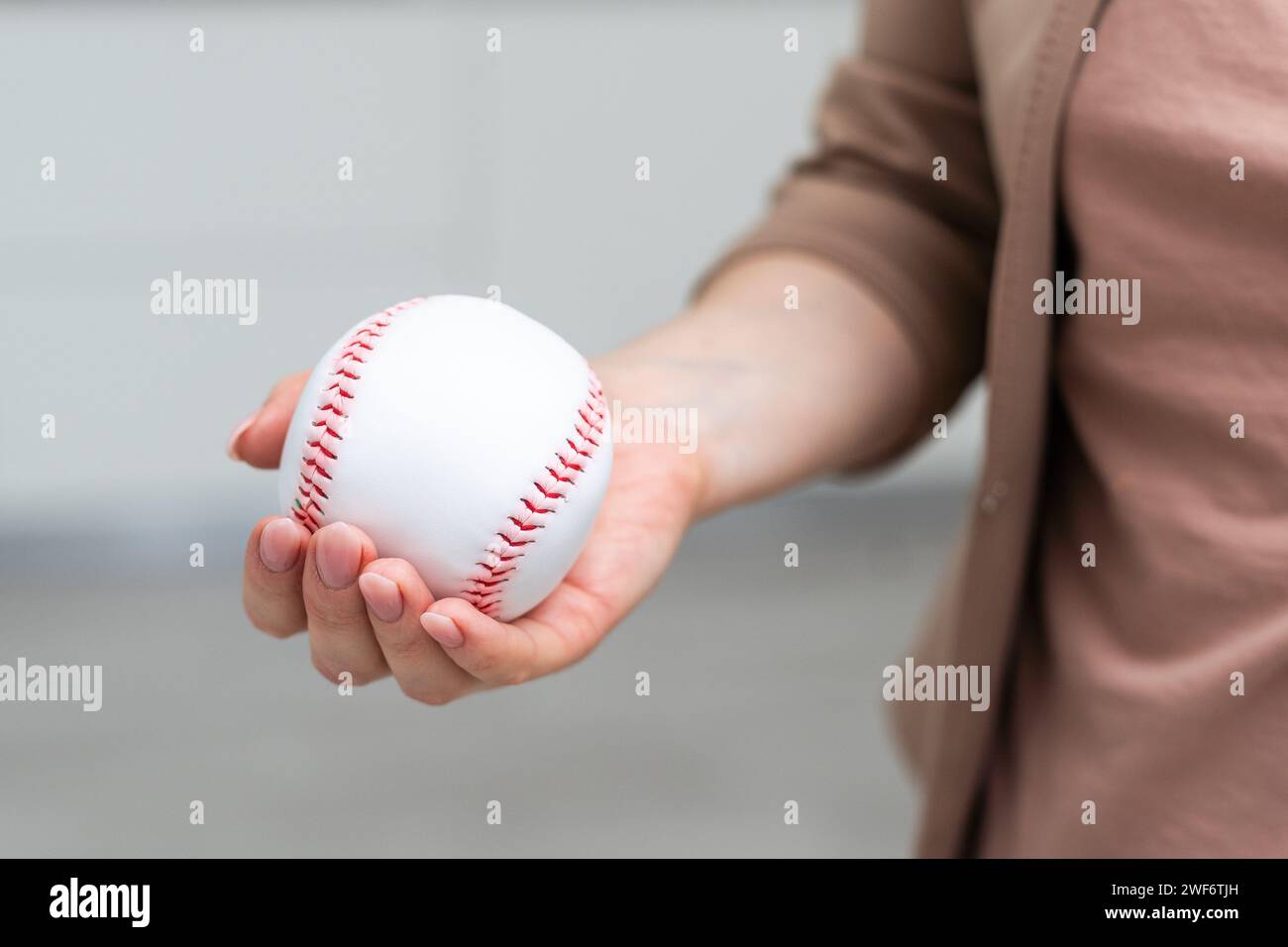 Small toy baseball isolated on white background Stock Photo - Alamy