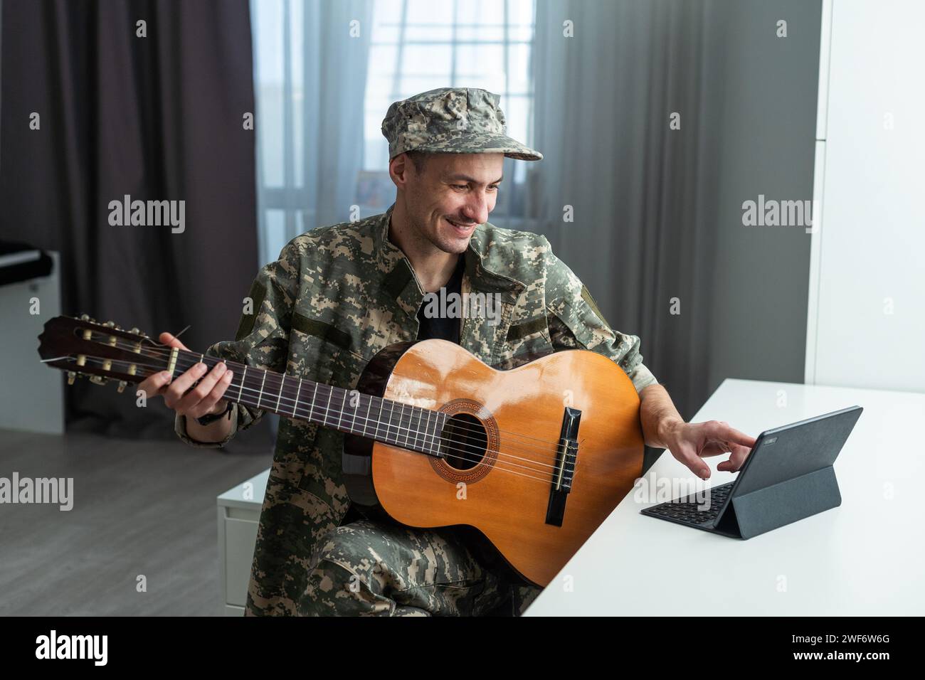 Veteran Guitar Play Concept. Family Meeting. Camouflage Uniform ...
