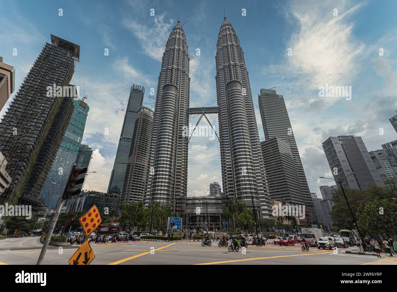 The Petronas Towers, a pair of interlinked 88-storey supertall ...