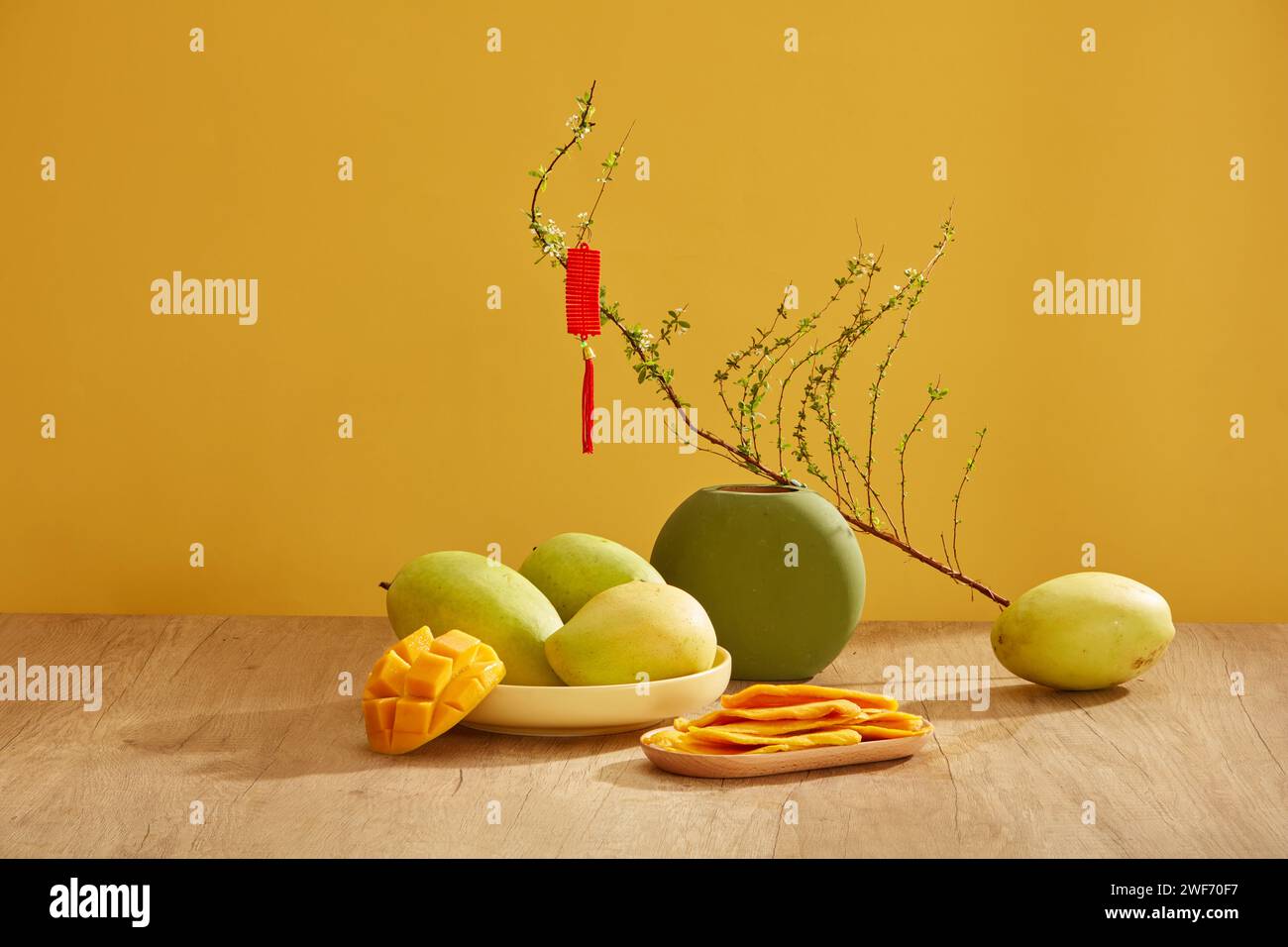 Mango and mango jam are common fruits on Tet holiday. Front view on ...